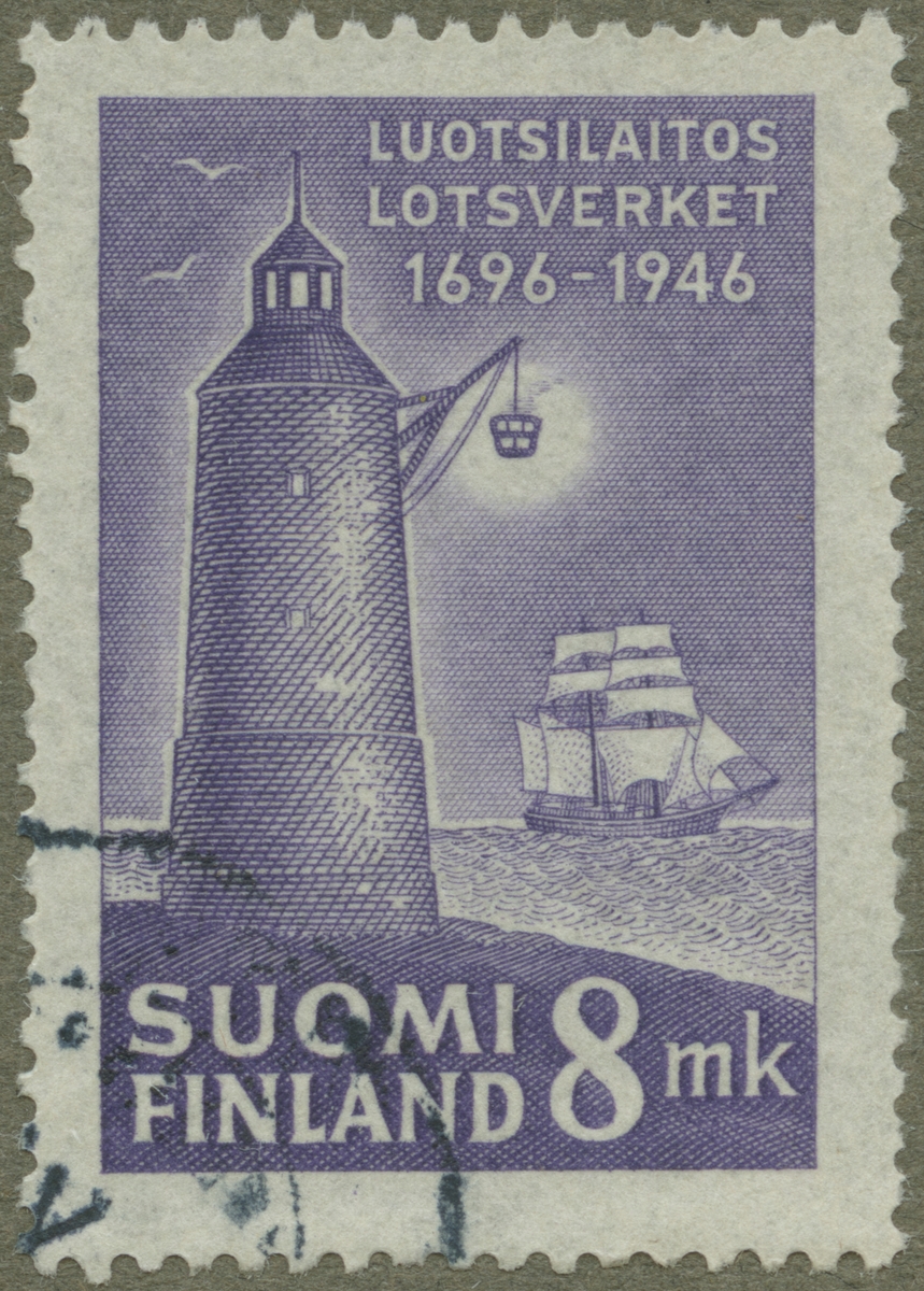 Frimärke med motiv av gammalt finskt fyrtorn med ljus från brinnande ...